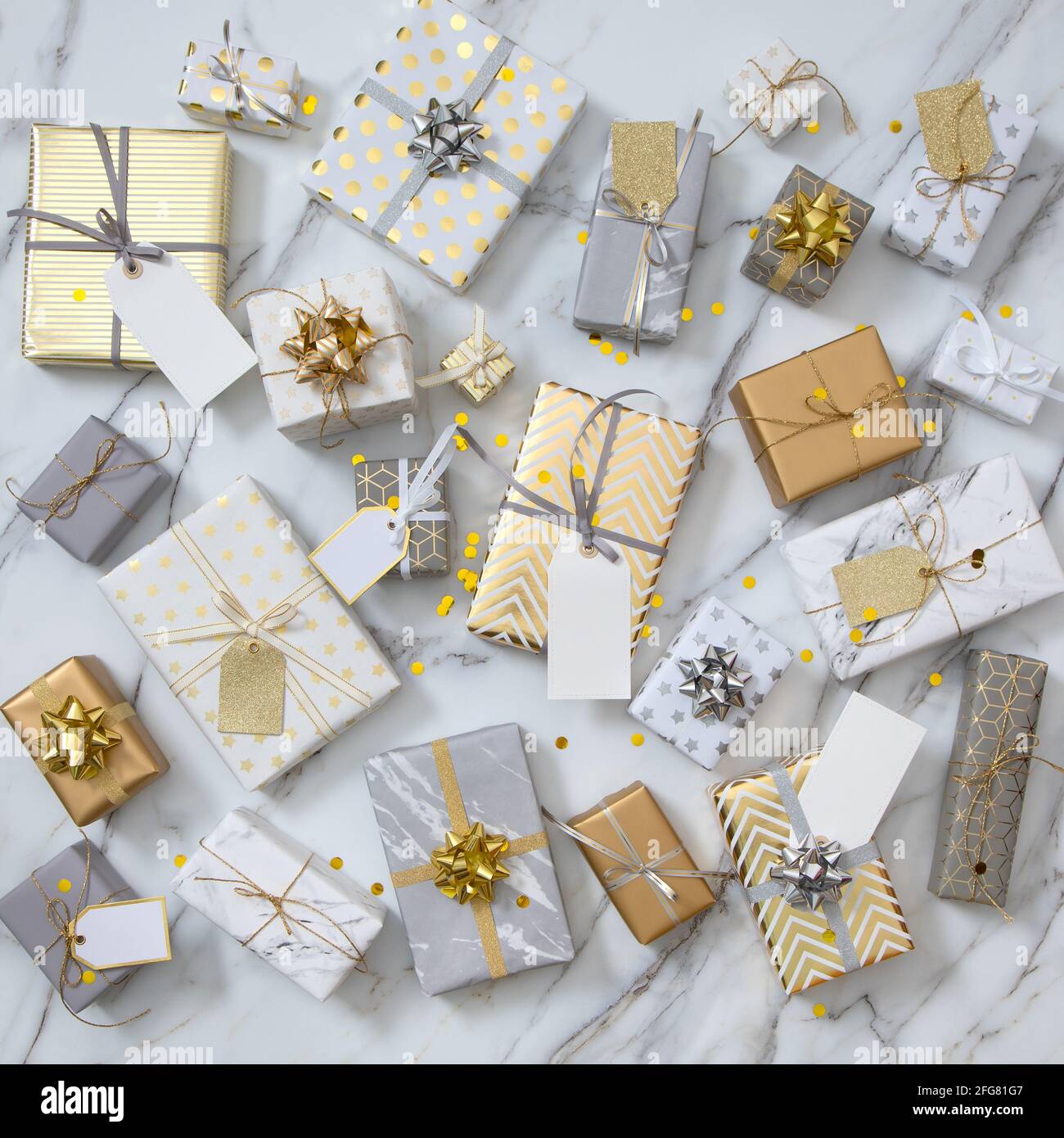 Many gift boxes with labels numbers wrapped in glossy classical pack ...