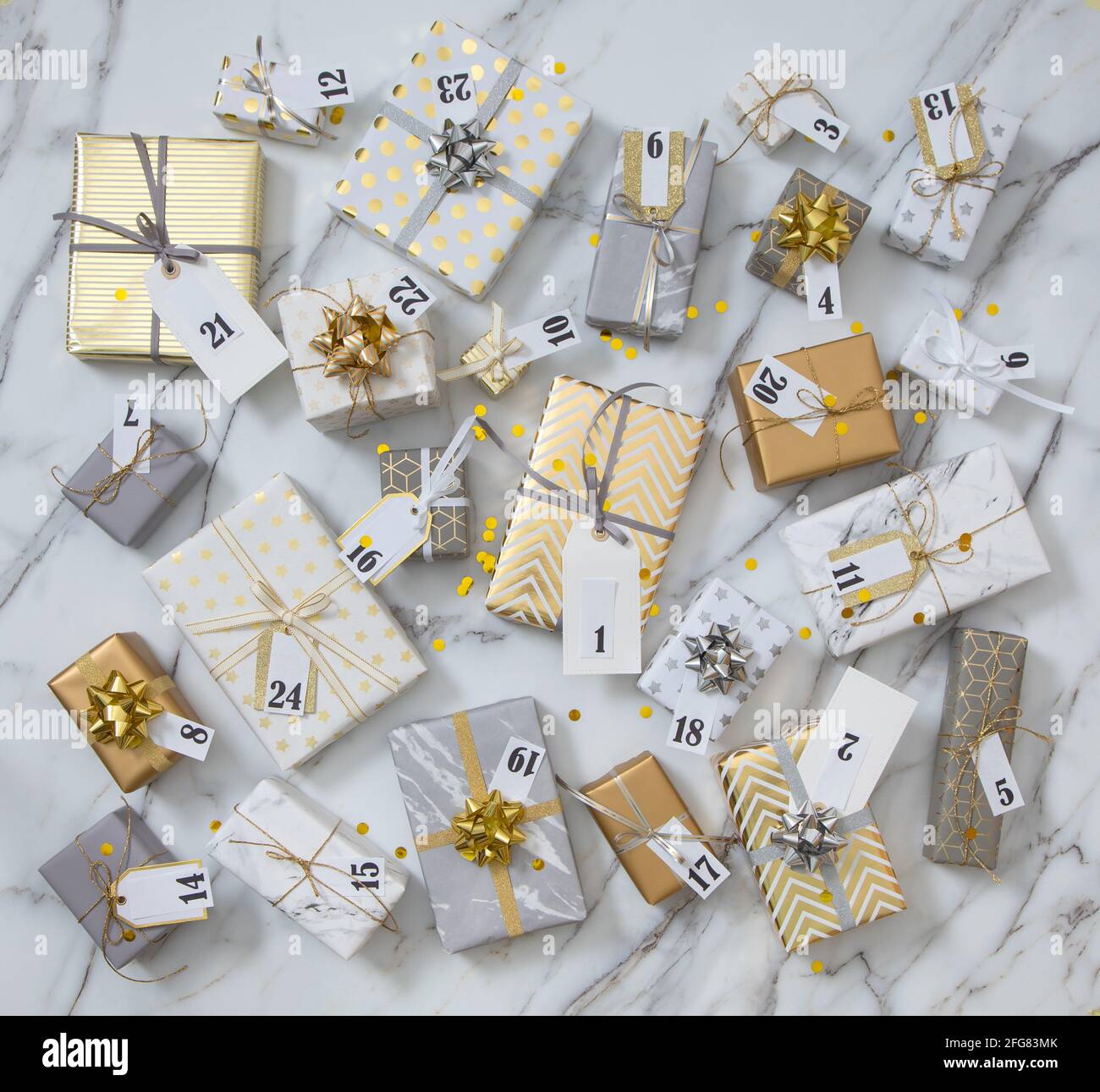 Many gift boxes with labels numbers for Advent calendar wrapped in ...