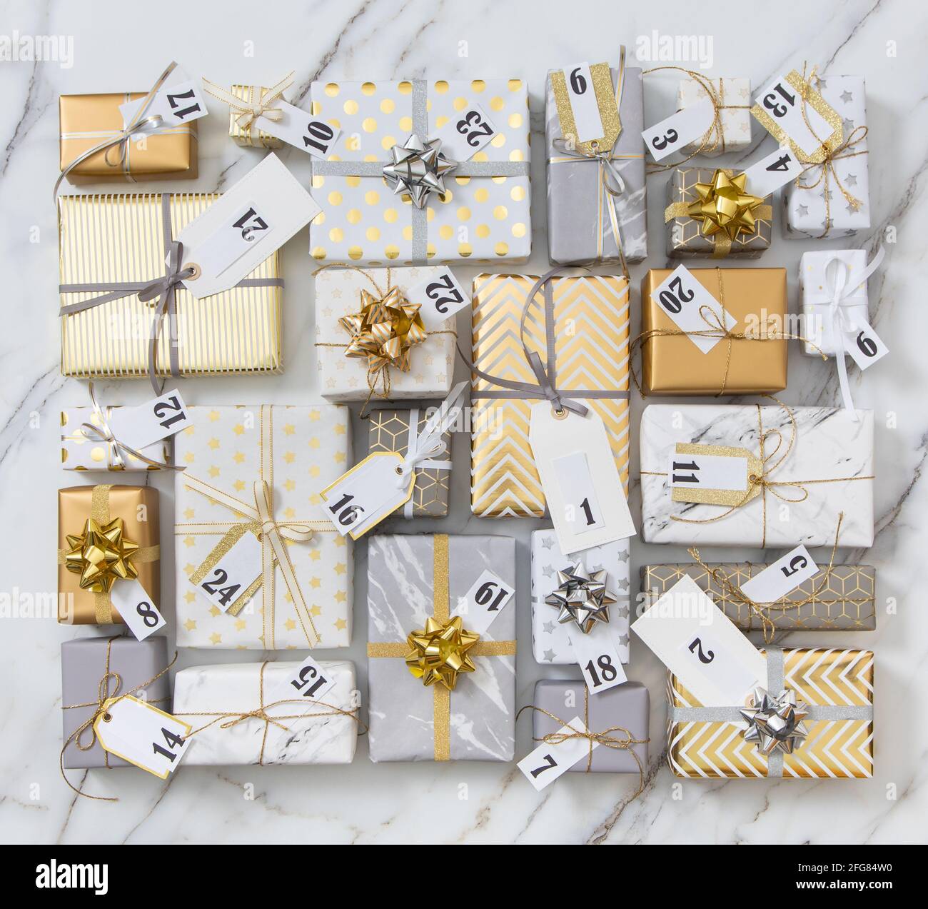 Many gift boxes with labels numbers for Advent calendar wrapped in ...