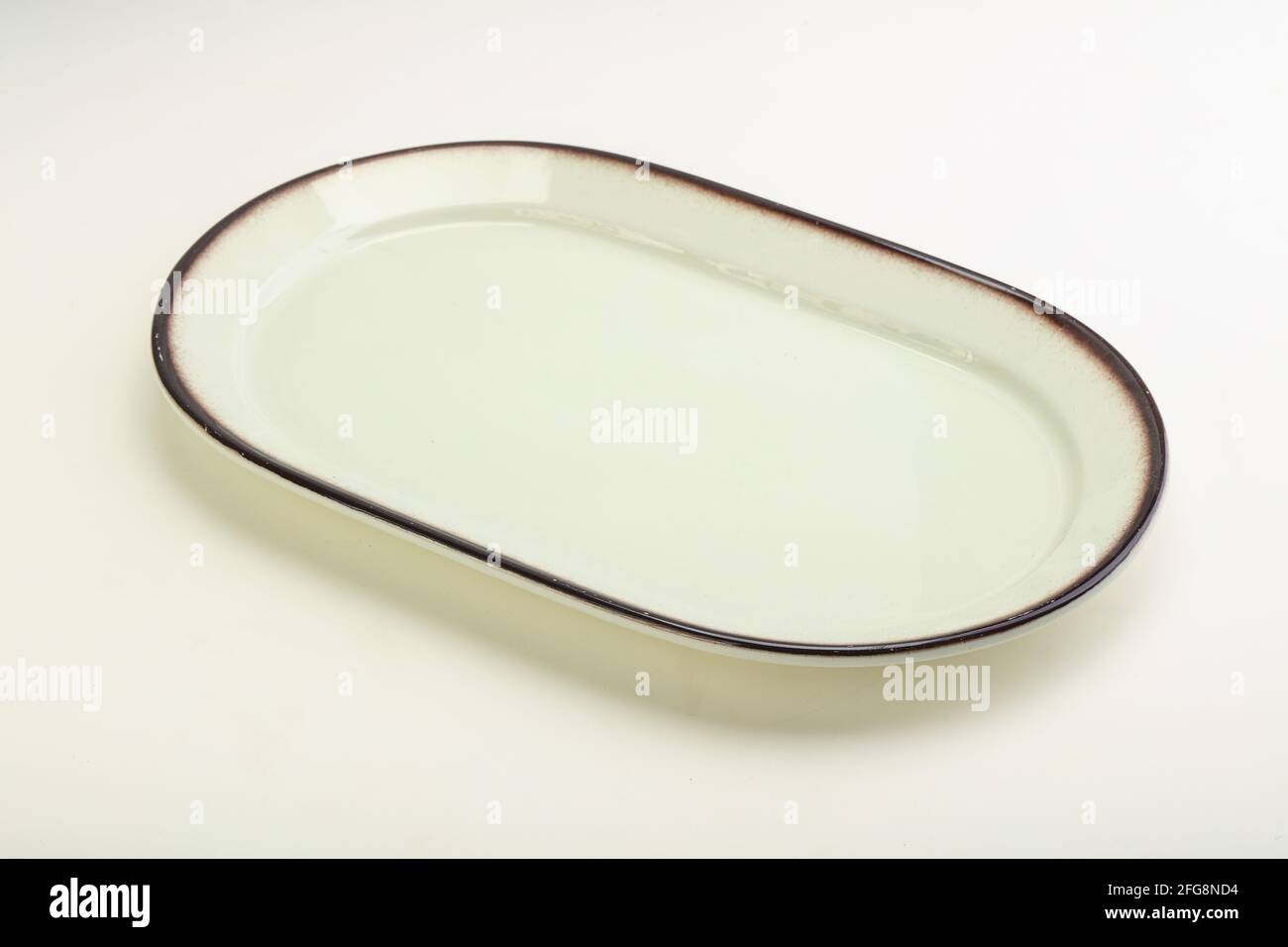White empty plate for serving isolated Stock Photo - Alamy