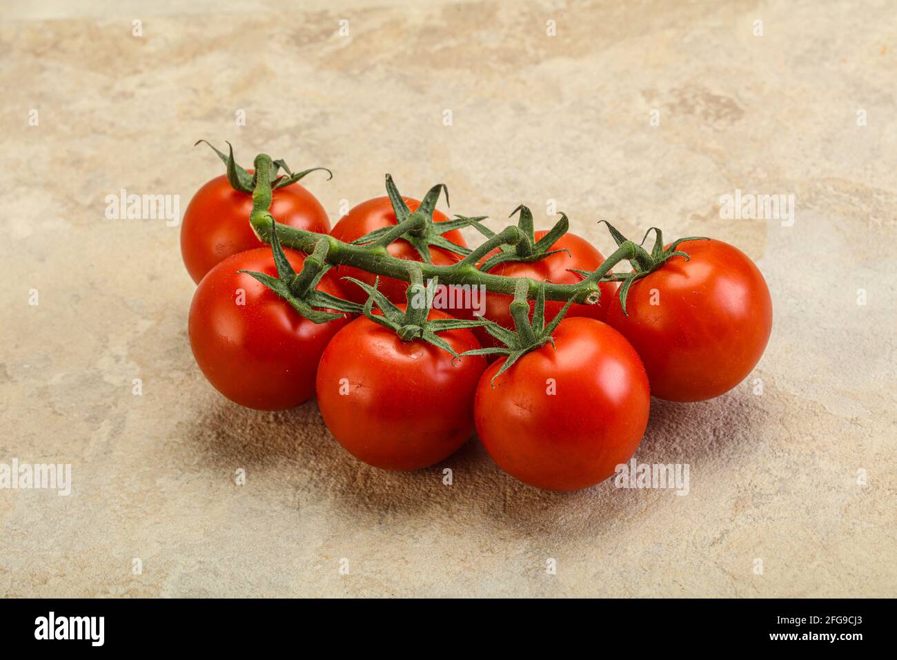 Fresh ripe cherry tomato branch isolated Stock Photo - Alamy