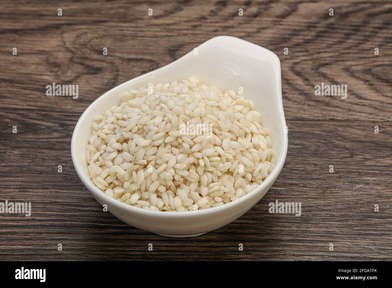 Raw Italian arborio rice for Risotto Stock Photo - Alamy