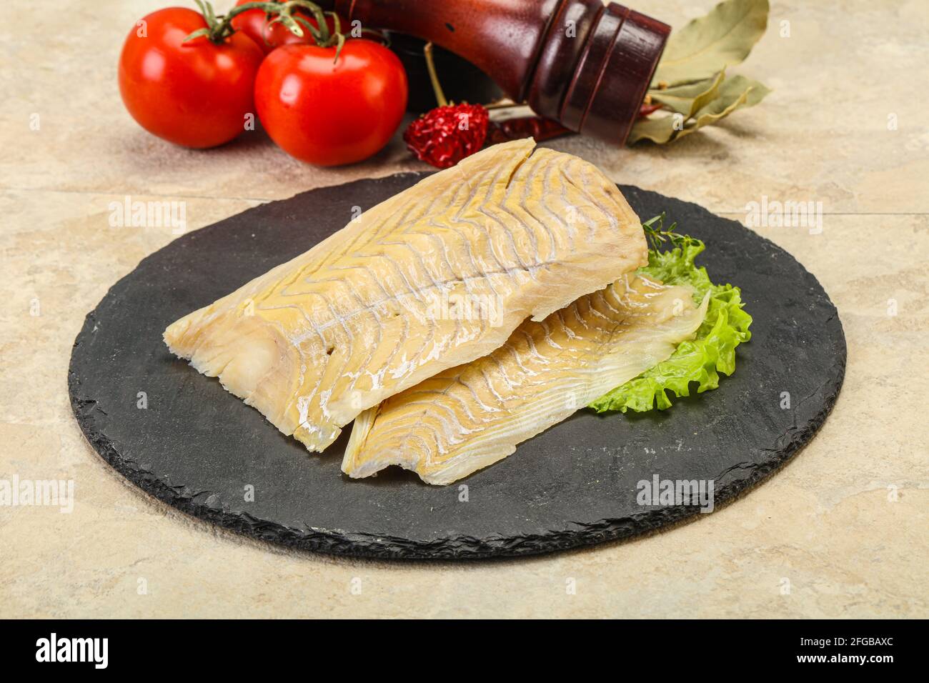 Raw cod fish fillet for cooking Stock Photo - Alamy