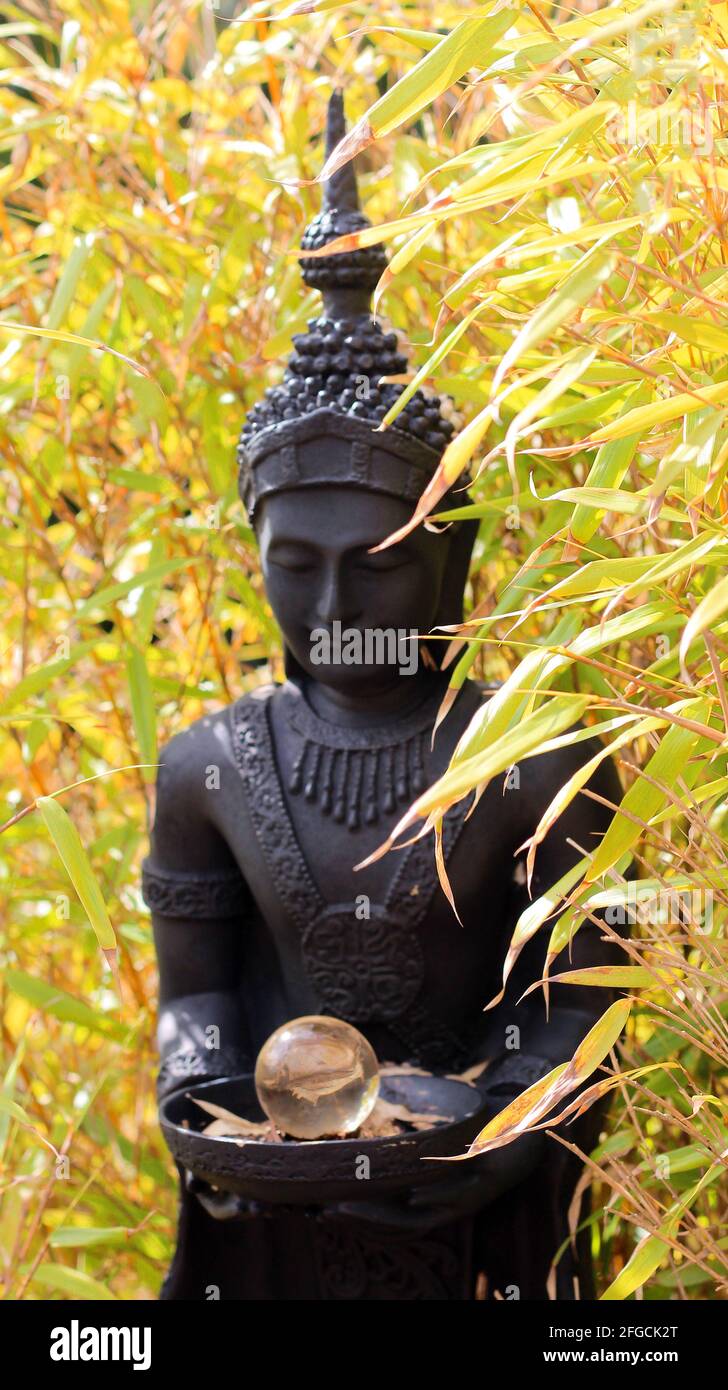 Buddha holding a ball hi-res stock photography and images - Alamy