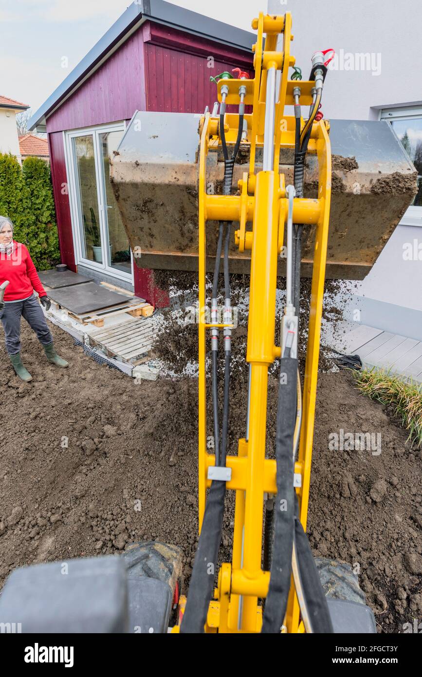 Rough earthworks using a wheel loader Stock Photo - Alamy