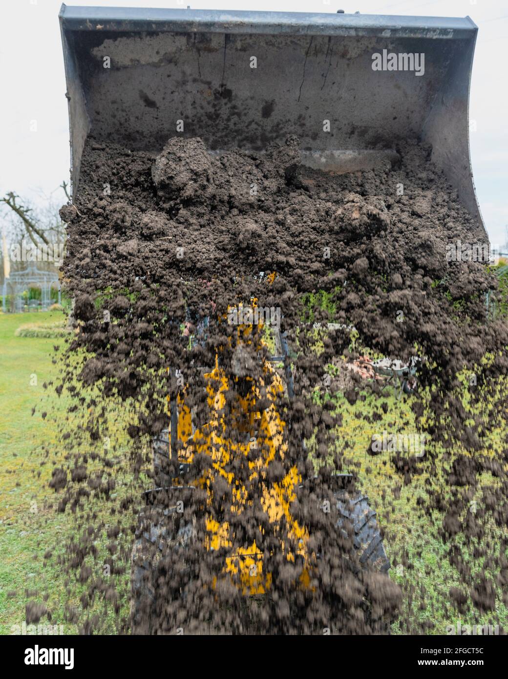 Rough earthworks using a wheel loader Stock Photo - Alamy