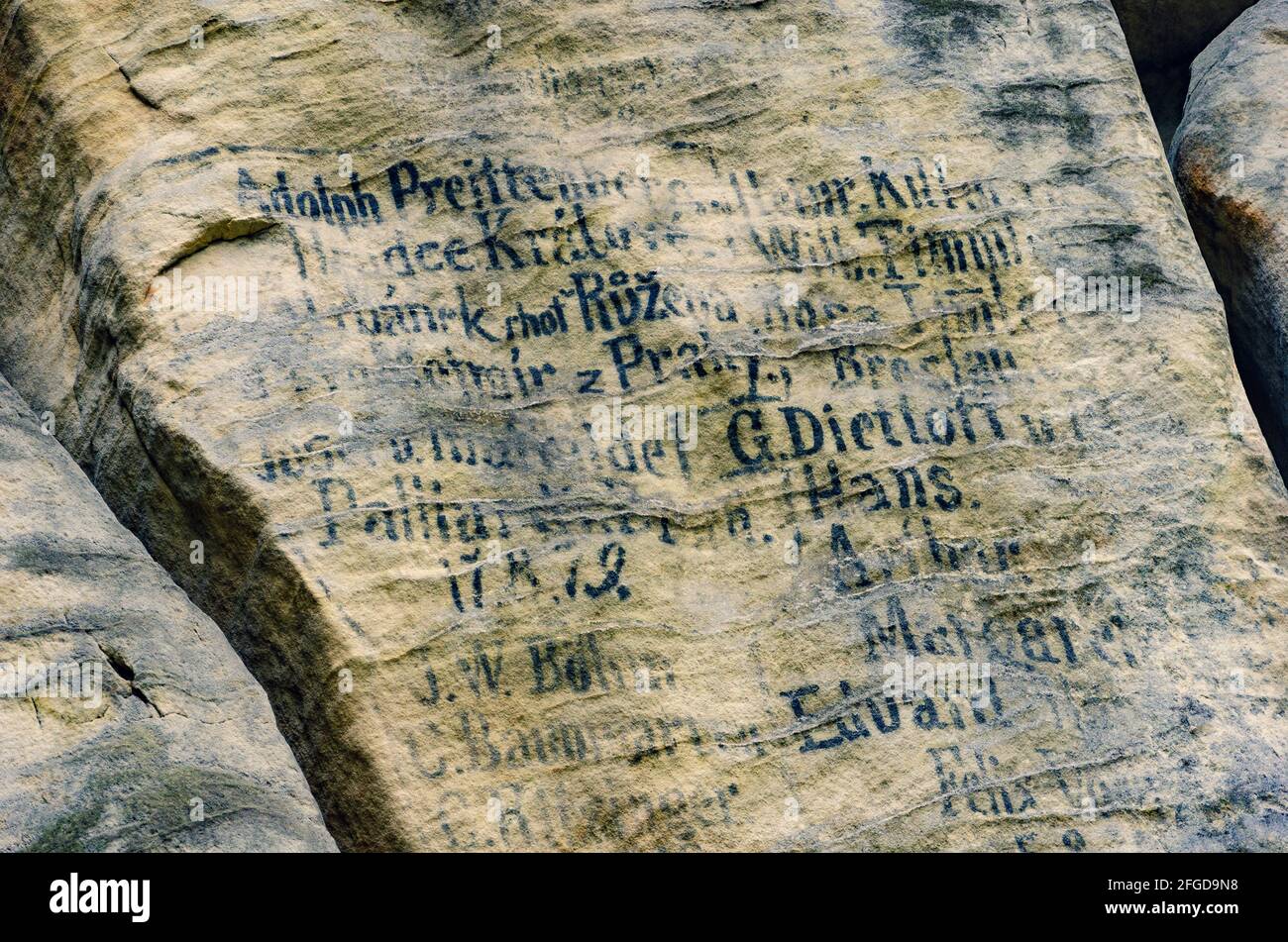 Beautiful weathered sandstone texture with ancient graffiti lettering ...