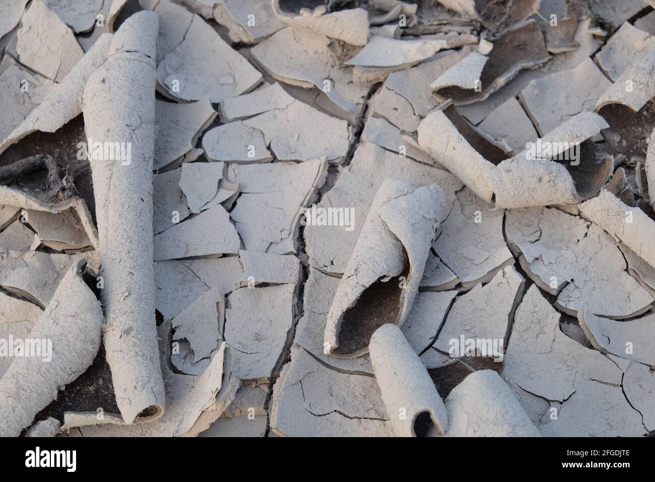 Flakes of dried mud as a background. Dry barren soil texture Stock ...