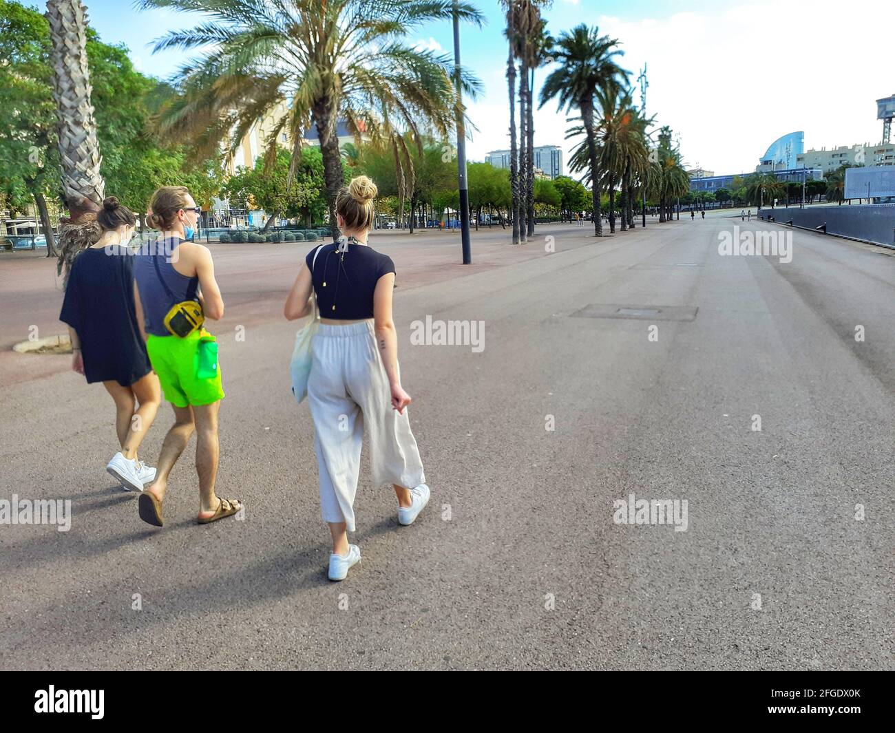 People walking along promenade Stock Photo - Alamy