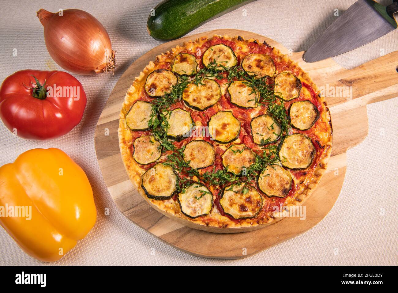 Vegetarian Provencal quiche recipe with vegetables, zucchini, tomato ...