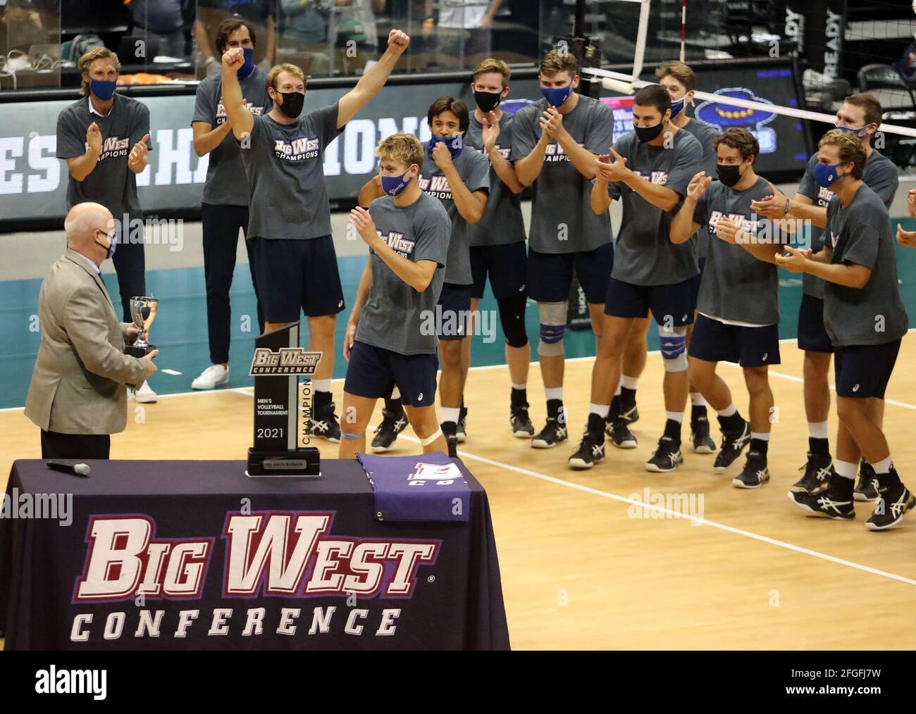 April 24, 2021 - Conference Commissioner Dan Butterly presented the MVP trophy to Honolulu ...