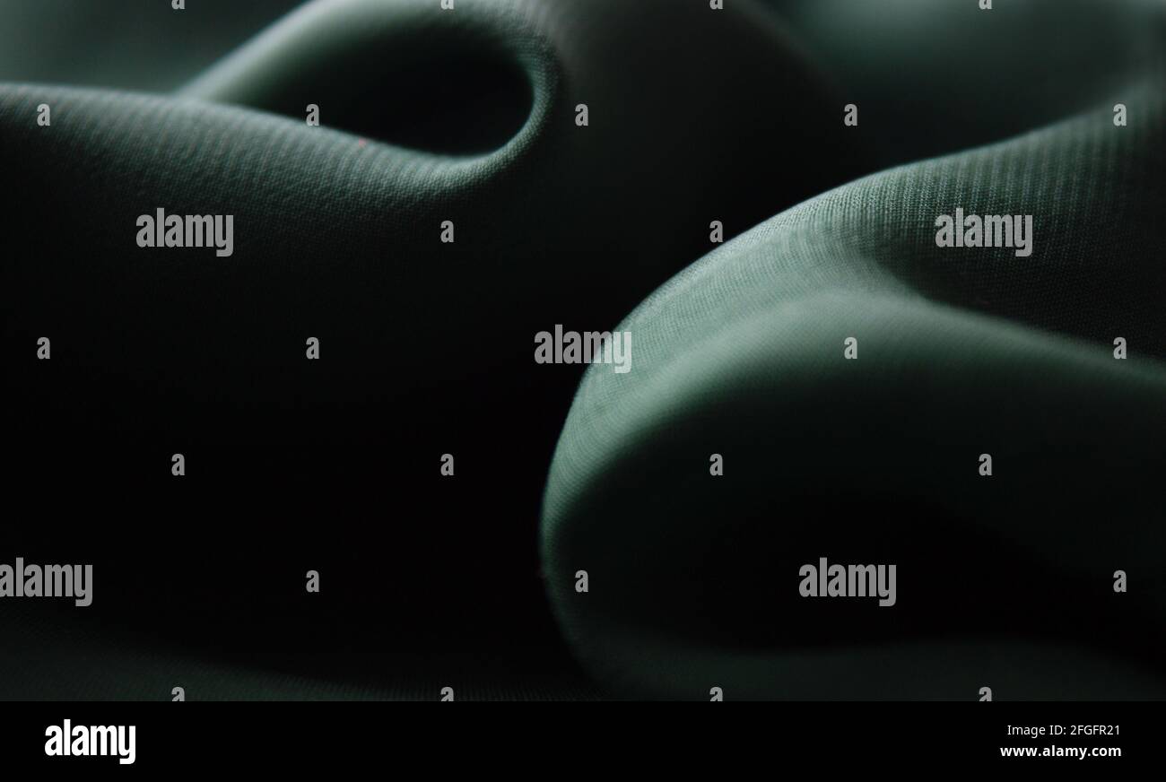 Close-up texture of green fabric or cloth in green color. Fabric ...