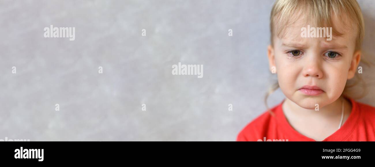kid crying. the face of a cute little upset four year old baby boy in ...