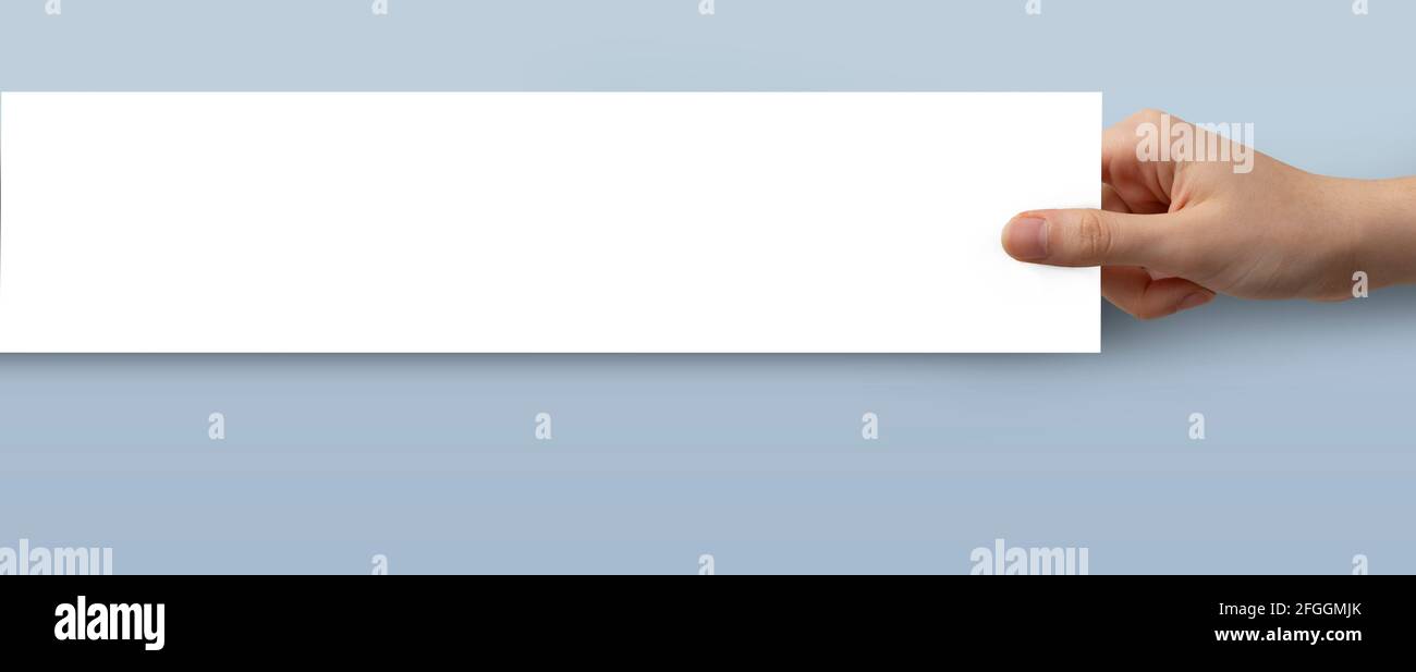 Hand holding white card on isolated background Stock Photo - Alamy