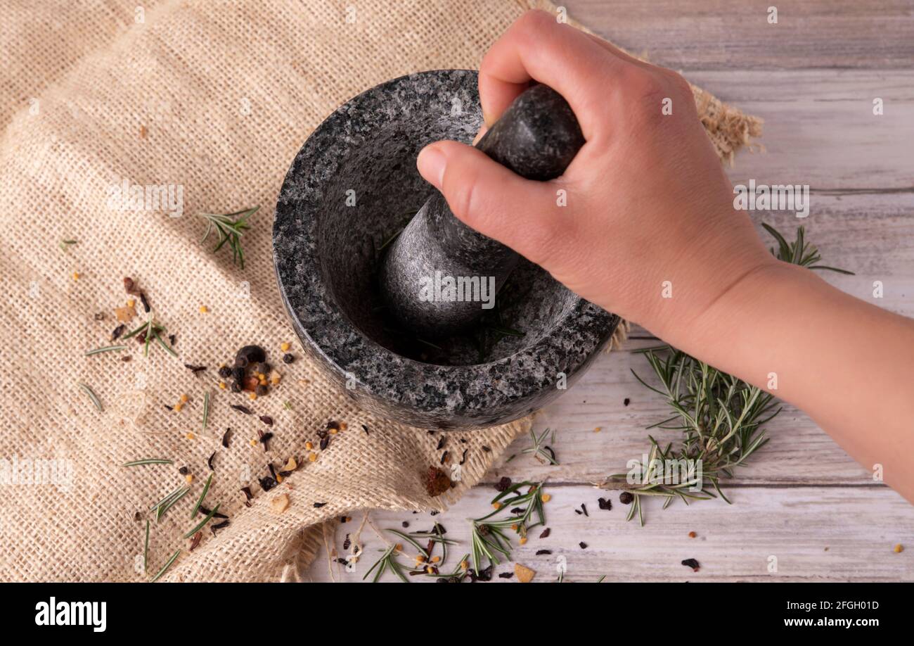 granite mortar for the kitchen Stock Photo - Alamy