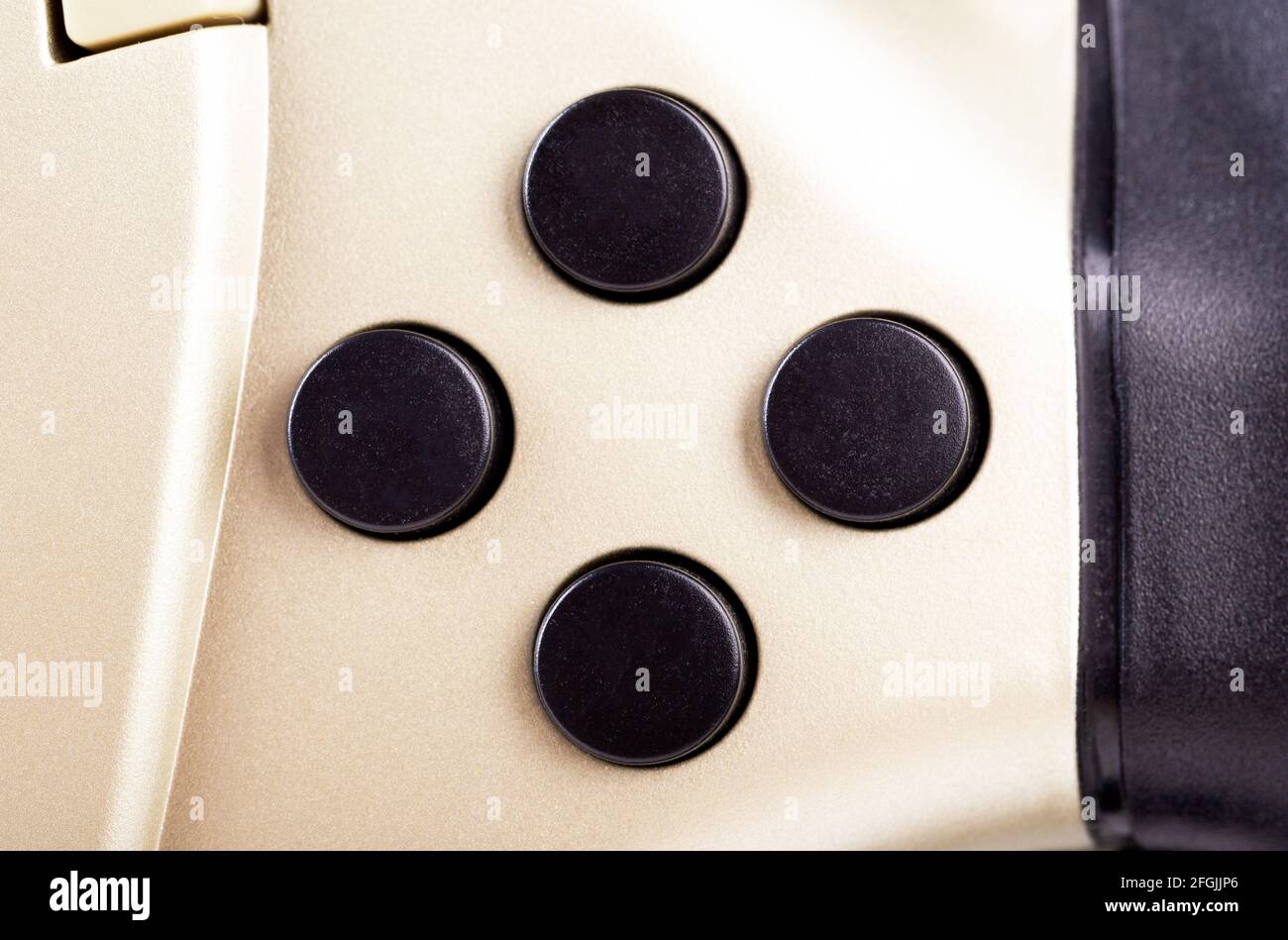 Four round blank, empty buttons on a simple game controller, object ...