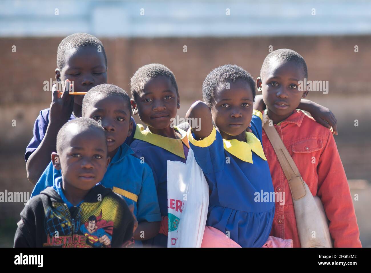 Mzuzu, Malawi. 30-05-2018. Beautiful portrait of 6 children looking at ...