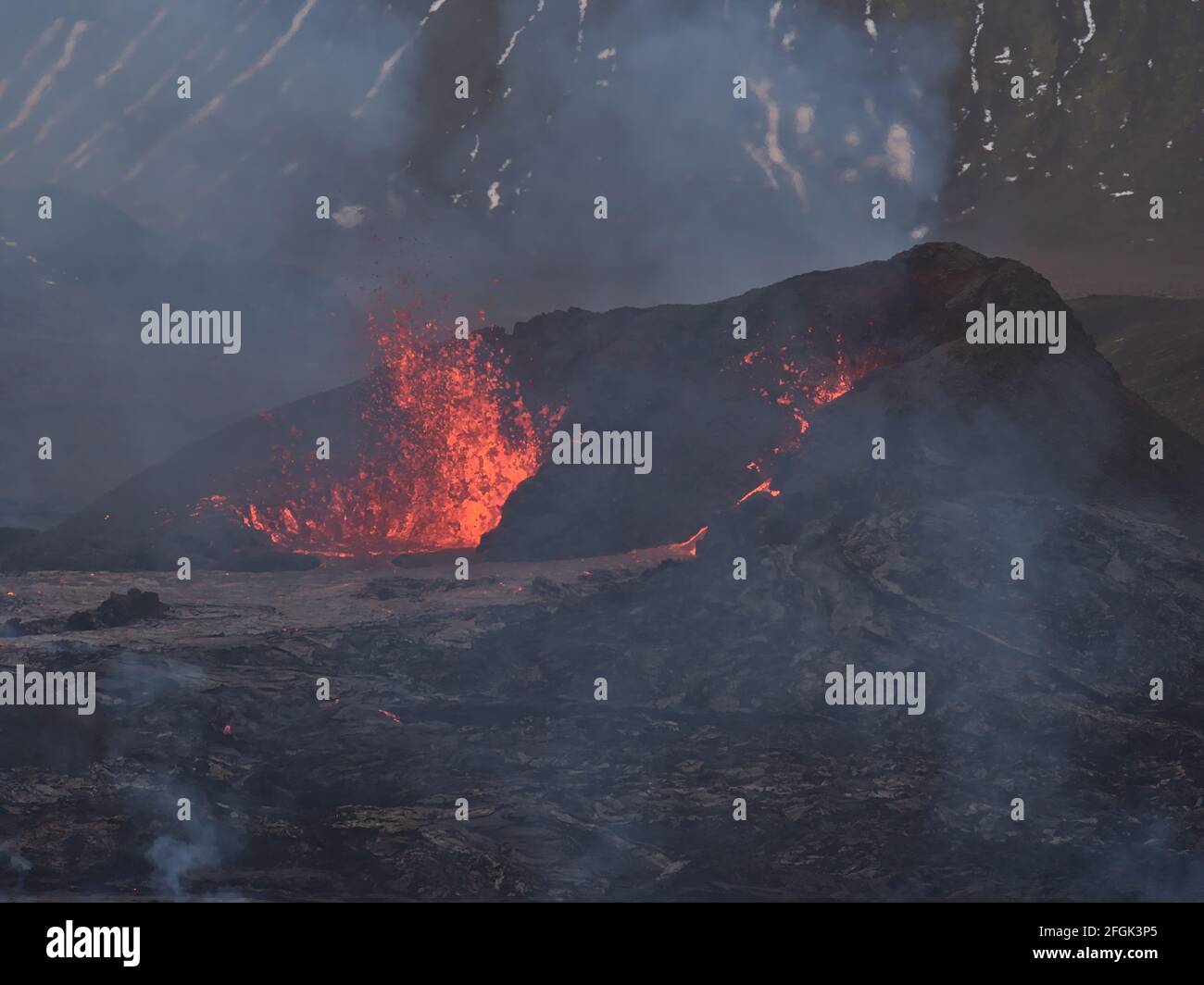 Close-up view of erupting volcano with dangerous smoke in Geldingadalir ...