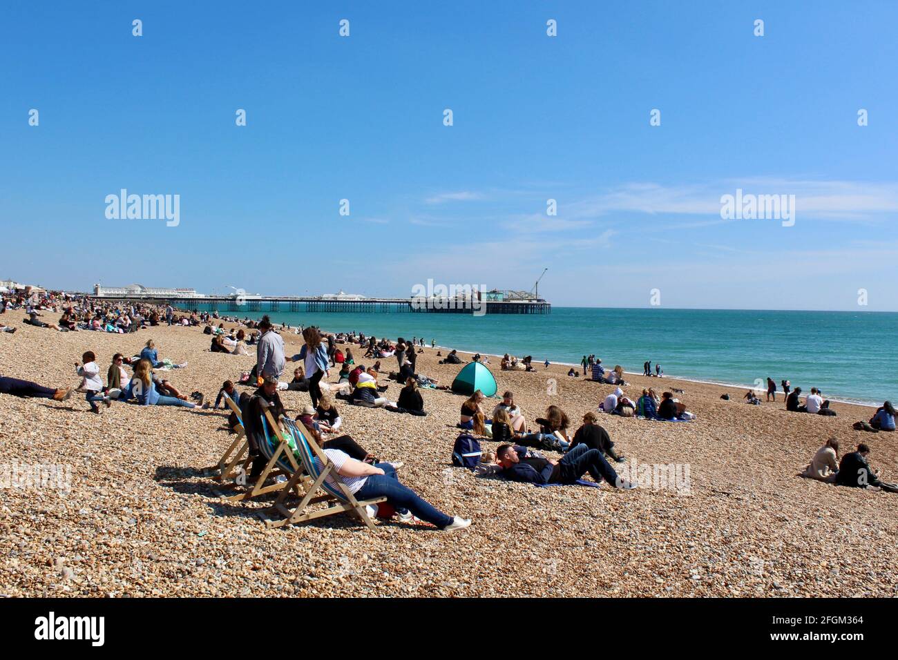 People enjoying easing od lockdown restrictions in Brighton, England ...