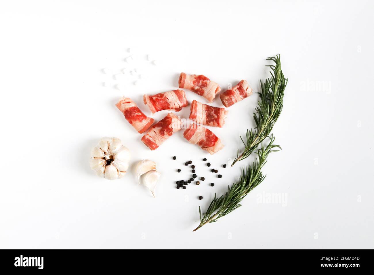 Raw meat in flat lay style with seasoning and garnish Stock Photo - Alamy