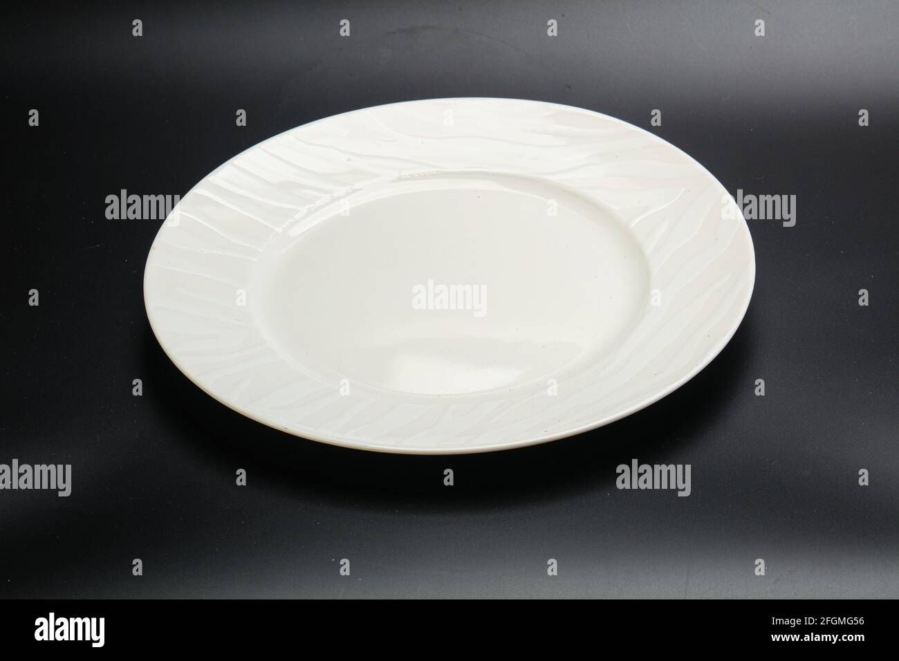 White empty plate for serving isolated Stock Photo - Alamy