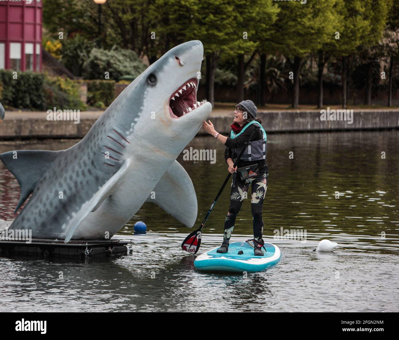 London, UK. 25th Apr, 2021. Members of Sub Islington Boat club admiring ...