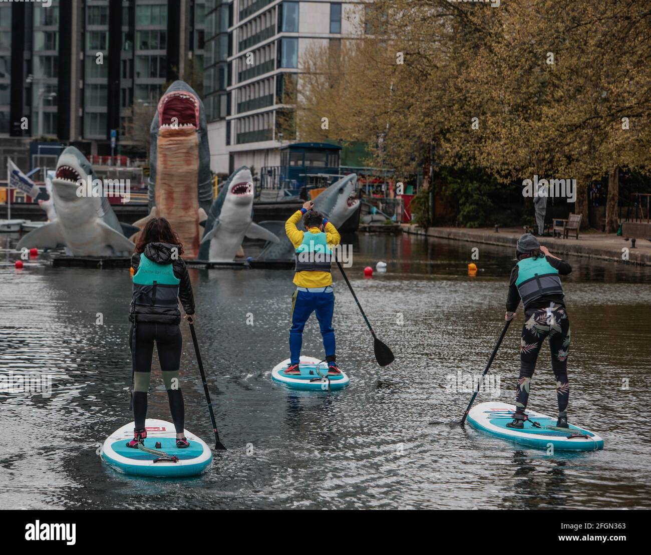 London, UK. 25th Apr, 2021. Members of Sub Islington Boat club admiring ...