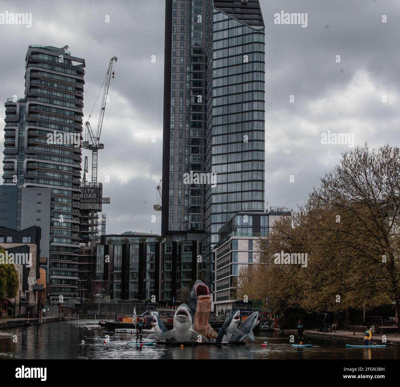 London, UK. 25th Apr, 2021. Members of Sub Islington Boat club admiring ...