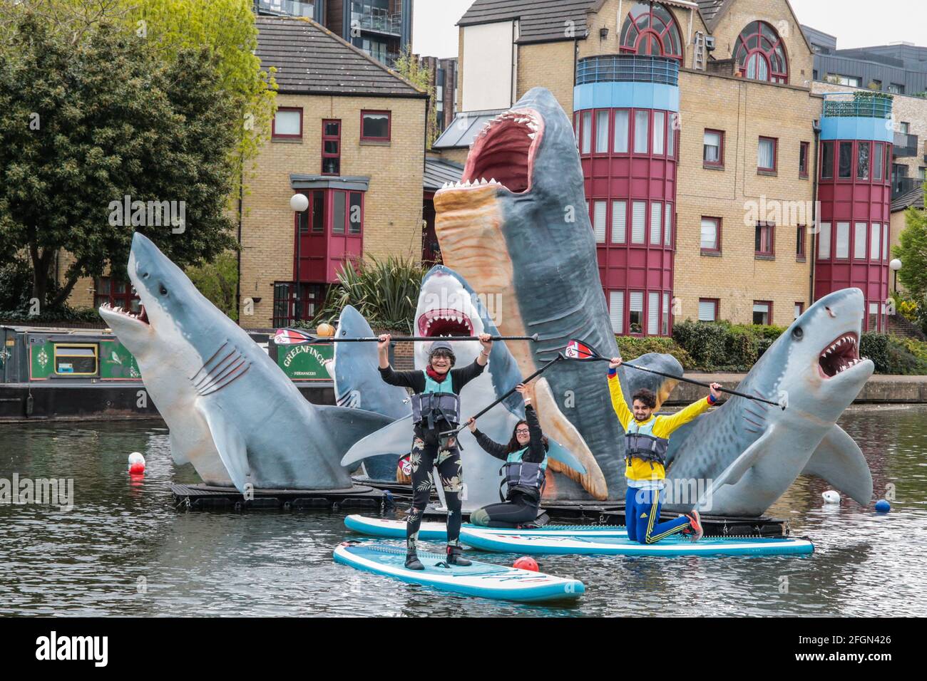 London, UK. 25th Apr, 2021. Members of Sub Islington Boat club admiring ...