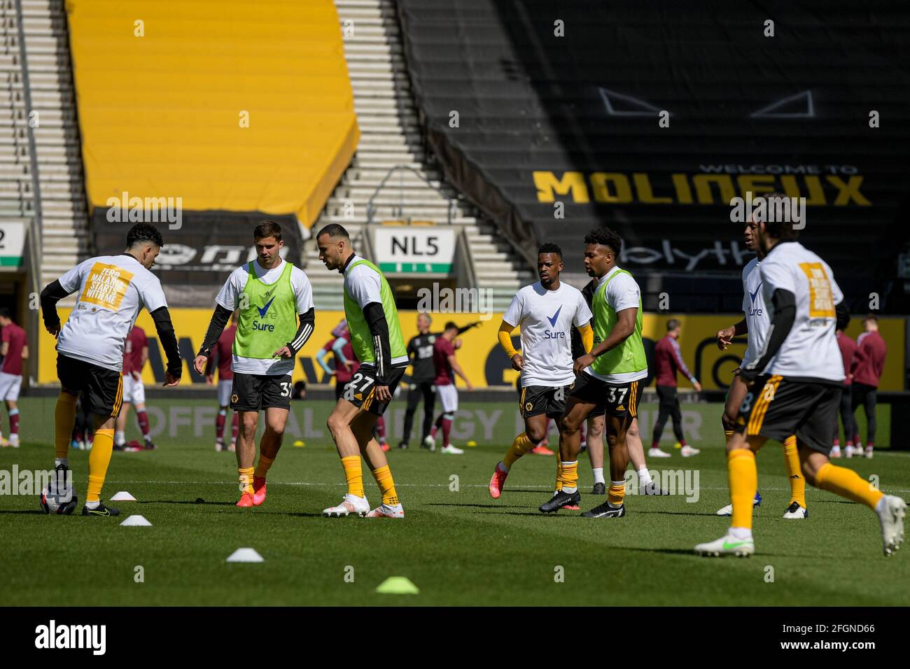 The players warm up on the pitch before the game hi-res stock ...