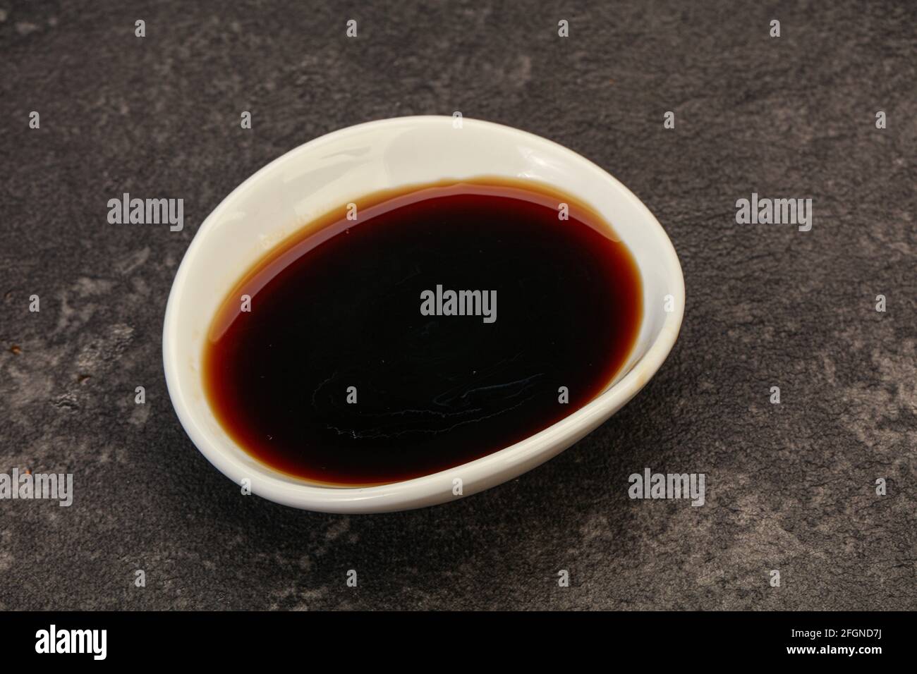 Asian cuisine - soya sauce in the bowl Stock Photo - Alamy