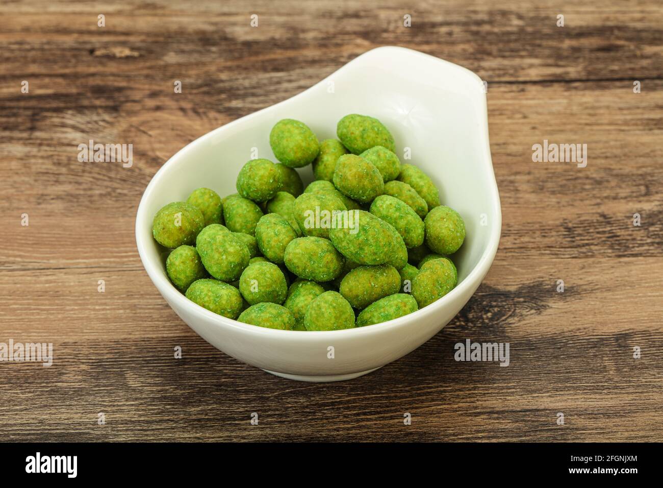 Spicy wasabi peanuts snack in the bowl Stock Photo - Alamy