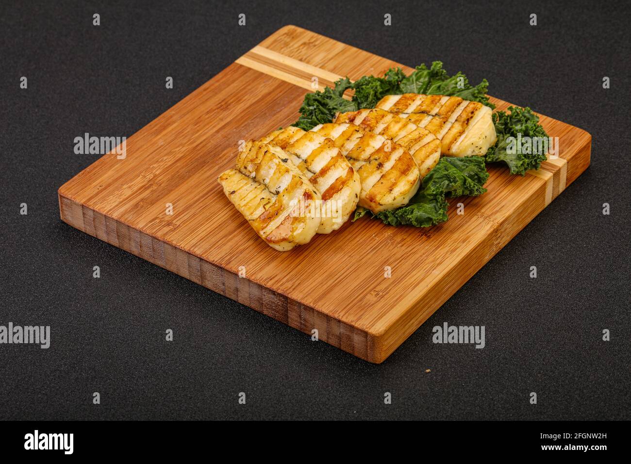 Grilled Greek haloumi cheese with herbs and spices Stock Photo - Alamy