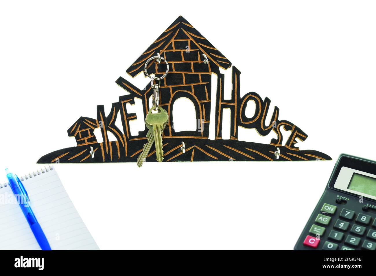 Close up view of buying house symbol with keys isolated on white ...