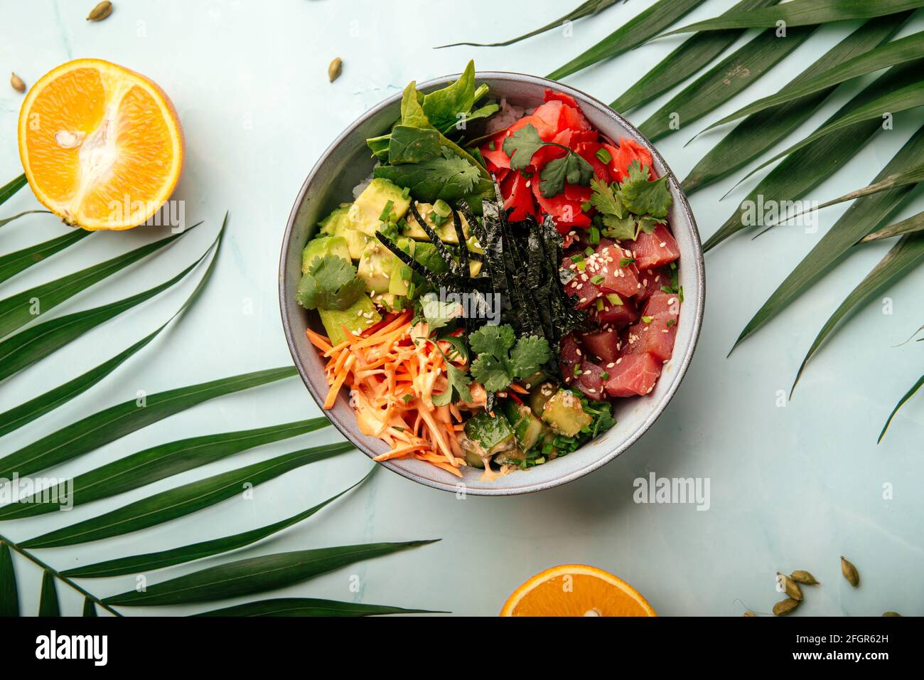 Hawaiian tuna poke bowl with rice and vegetables Stock Photo - Alamy