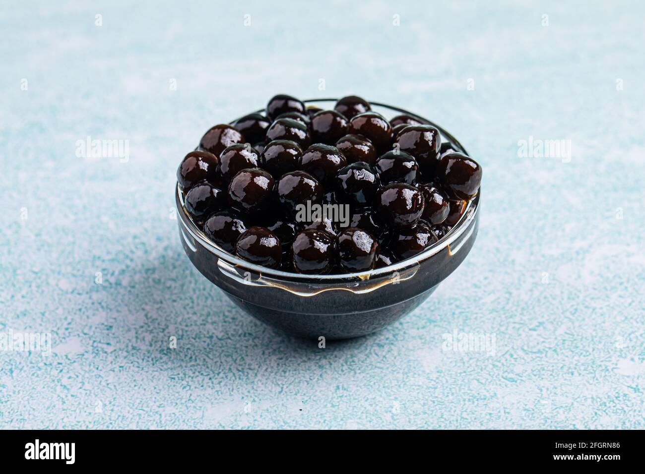 Glass bowl of black tapioca pearl bubbles Stock Photo - Alamy