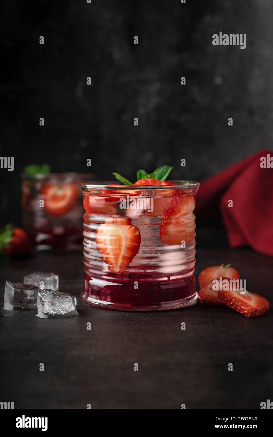 bar magazine concept. cocktail, drink with ice and fresh strawberries ...