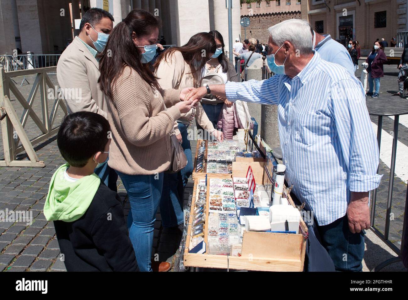 Rome, Italy. 25th Apr, 2021. Faithful wearing a face mask attends the ...
