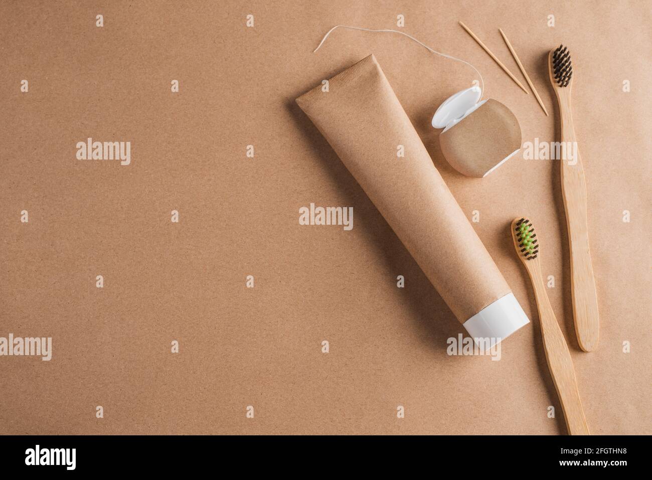 Set of organic toothpaste, bamboo toothbrushes, toothpicks and dental ...