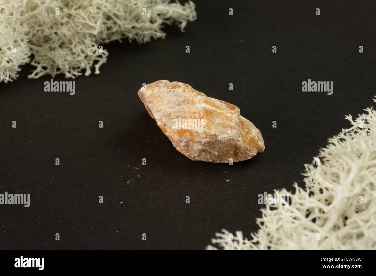 Orange Calcite from Brazil. Natural mineral stone on black background ...