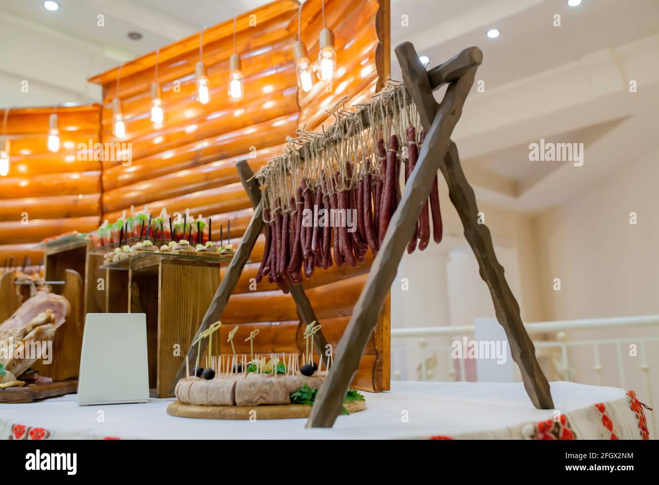 Traditional Hunting Sausages on the table. Family gathering for food ...