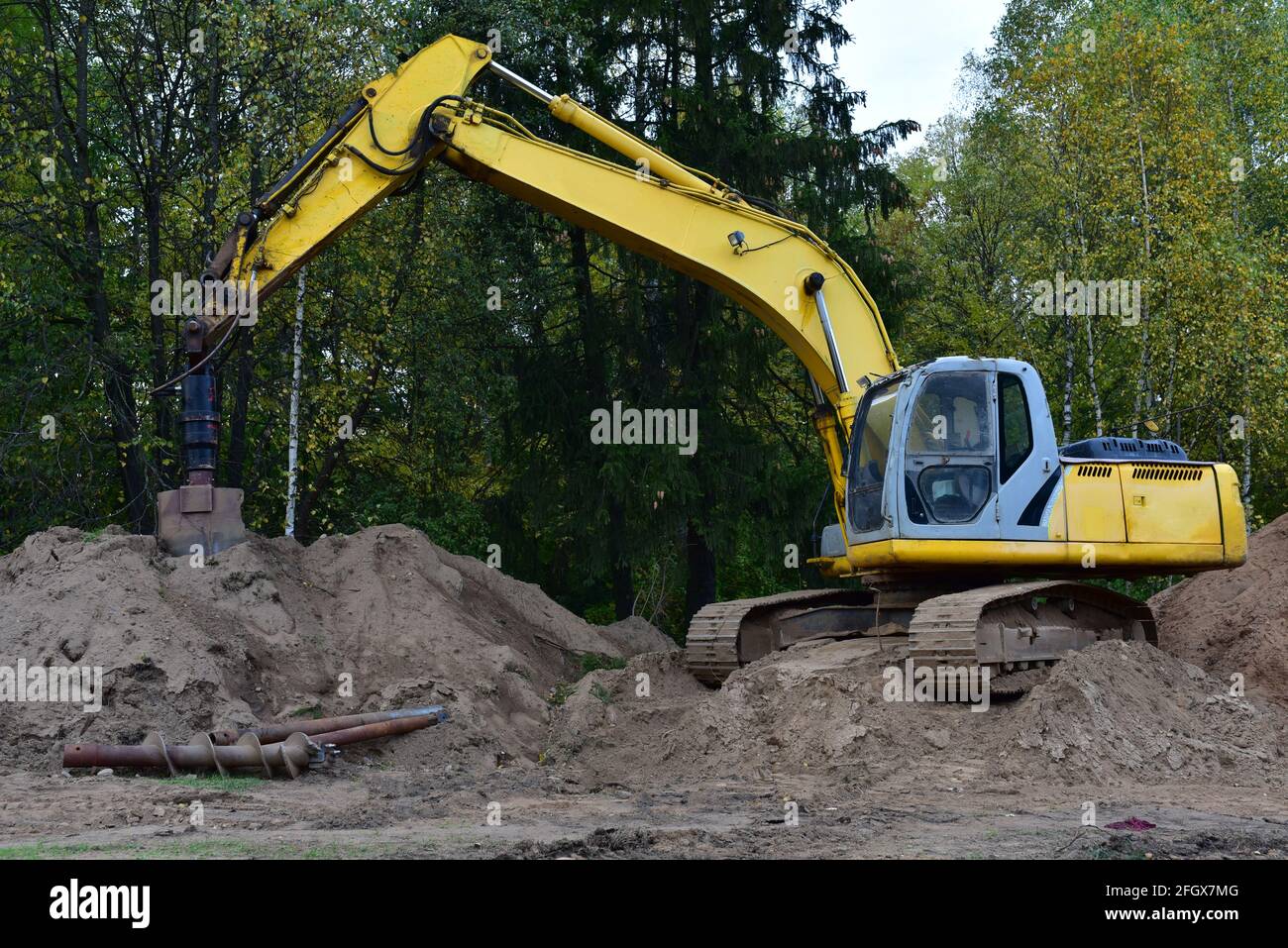 Excavator with Vertical tamrock pile foundation drilling machine. Drill ...