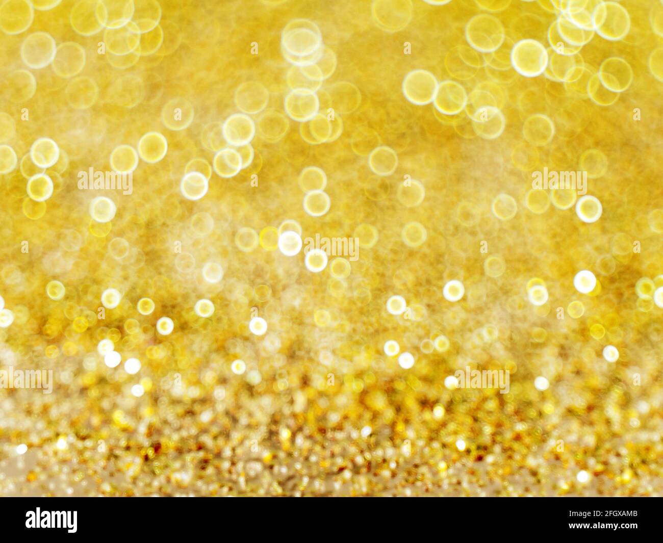 Golden defocused glitter. Bright blurred sparkling background. Shiny ...