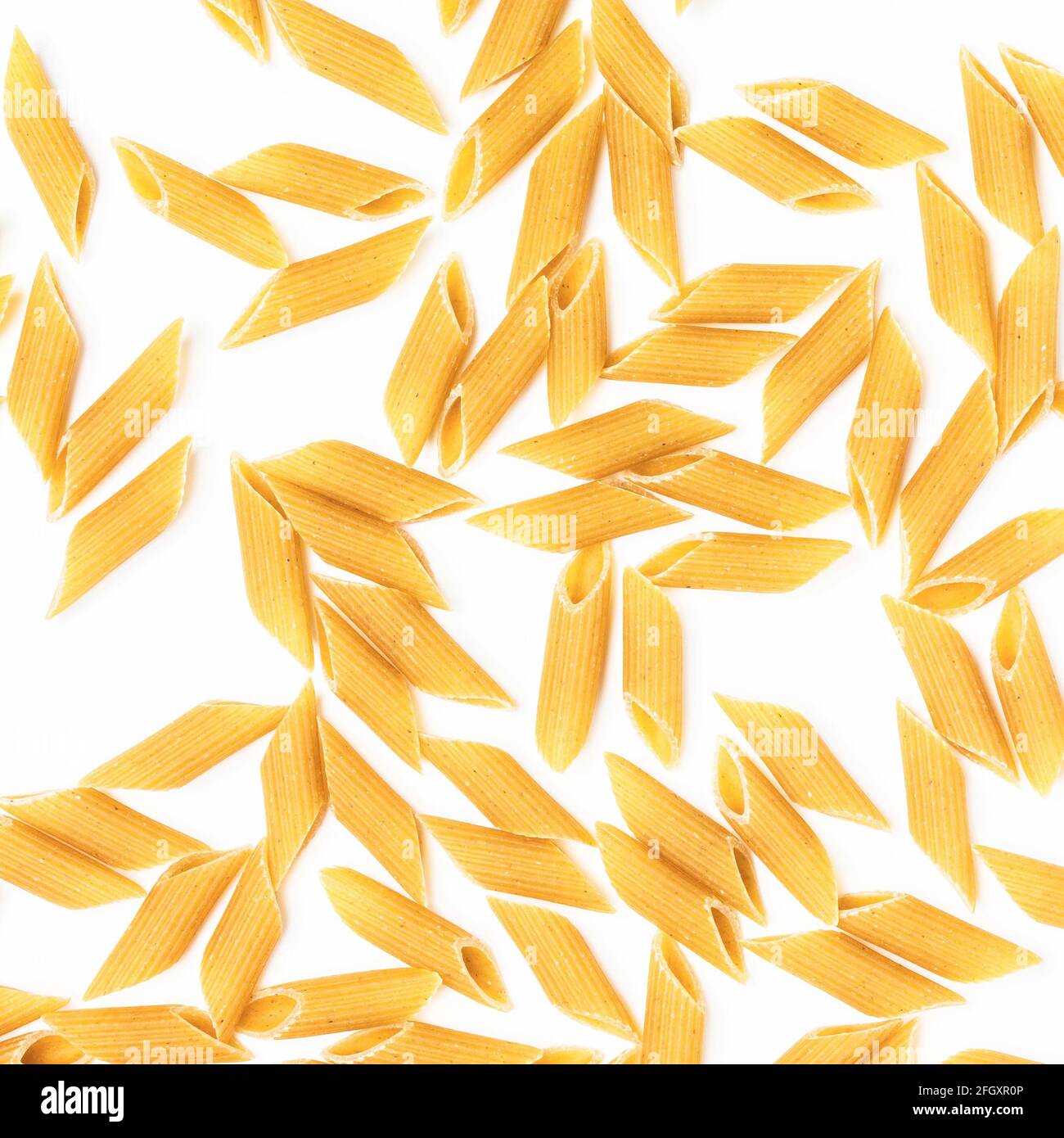 Penne rigate pasta. Pasta on white background. Dry penne rigate pasta ...