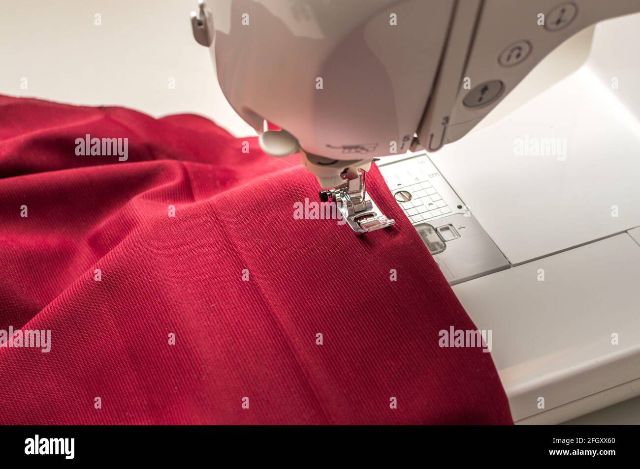 Sewing machine in the process of working close-up. Concept seamstress ...