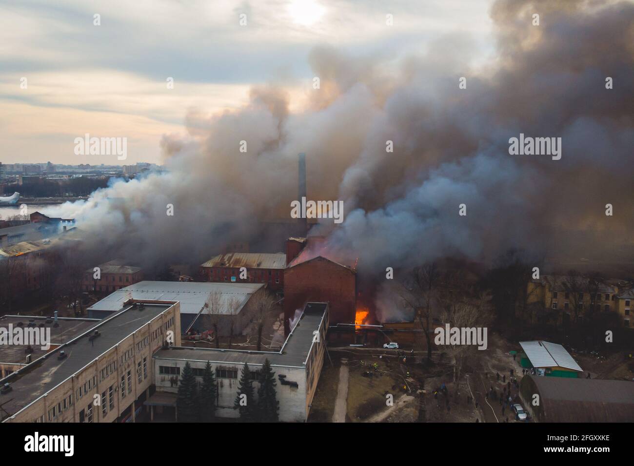 Massive large blaze fire in the city, aerial drone top view brick ...