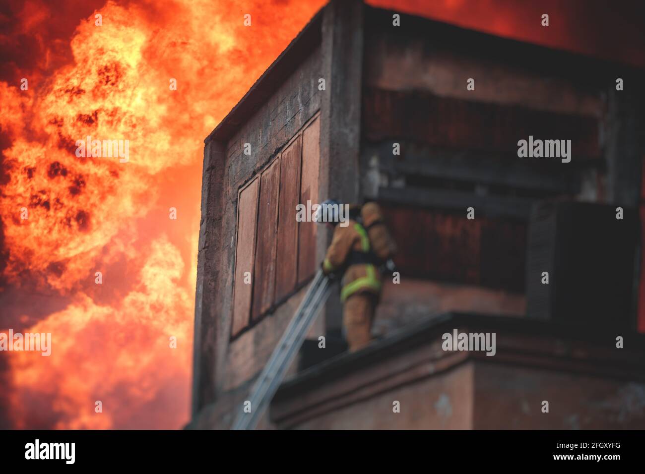 Firefighters put out large massive fire blaze, group of fire men in ...