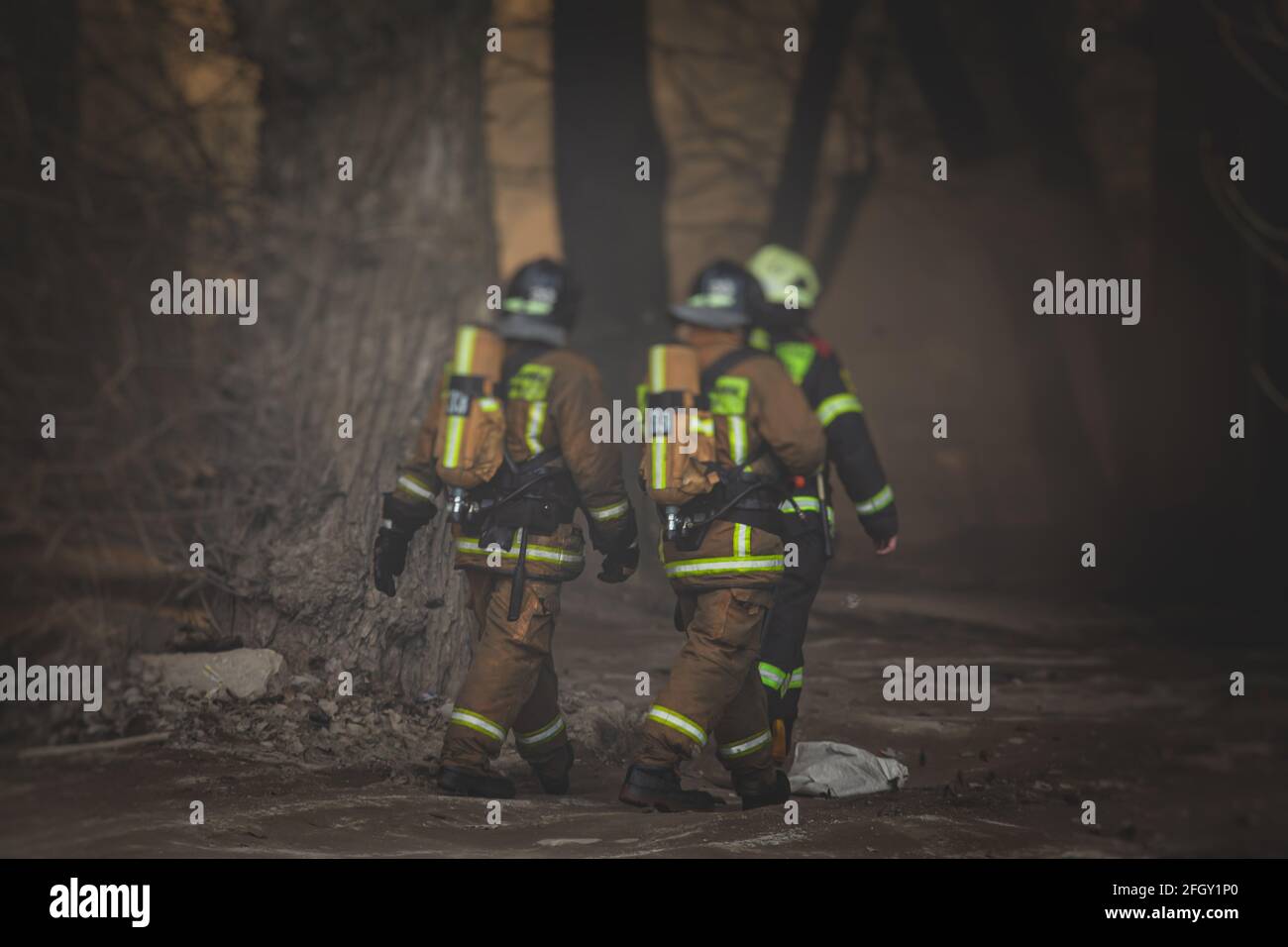 Firefighters put out large massive fire blaze, group of fire men in ...