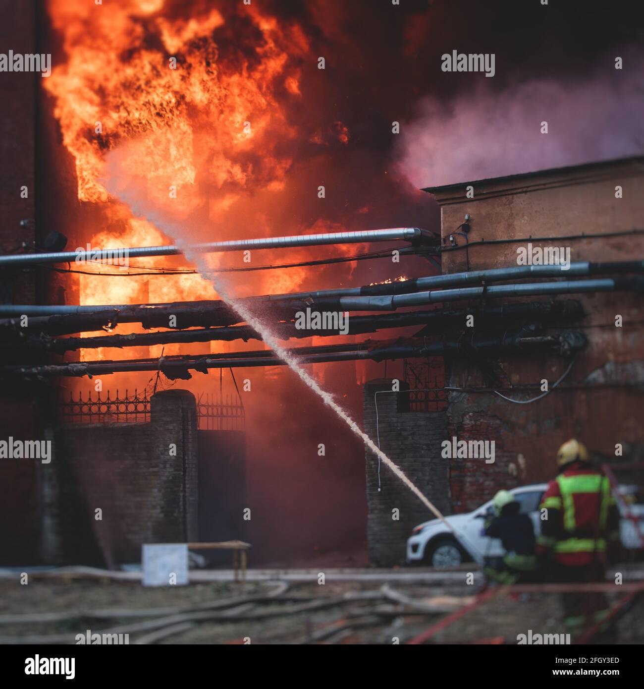 Firefighters put out large massive fire blaze, group of fire men in ...