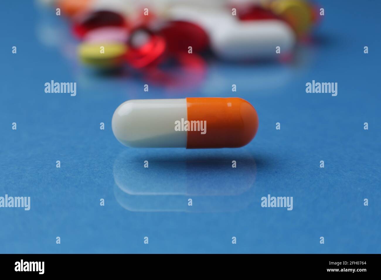 Colorful of tablets and capsules pill in blister packaging arranged ...